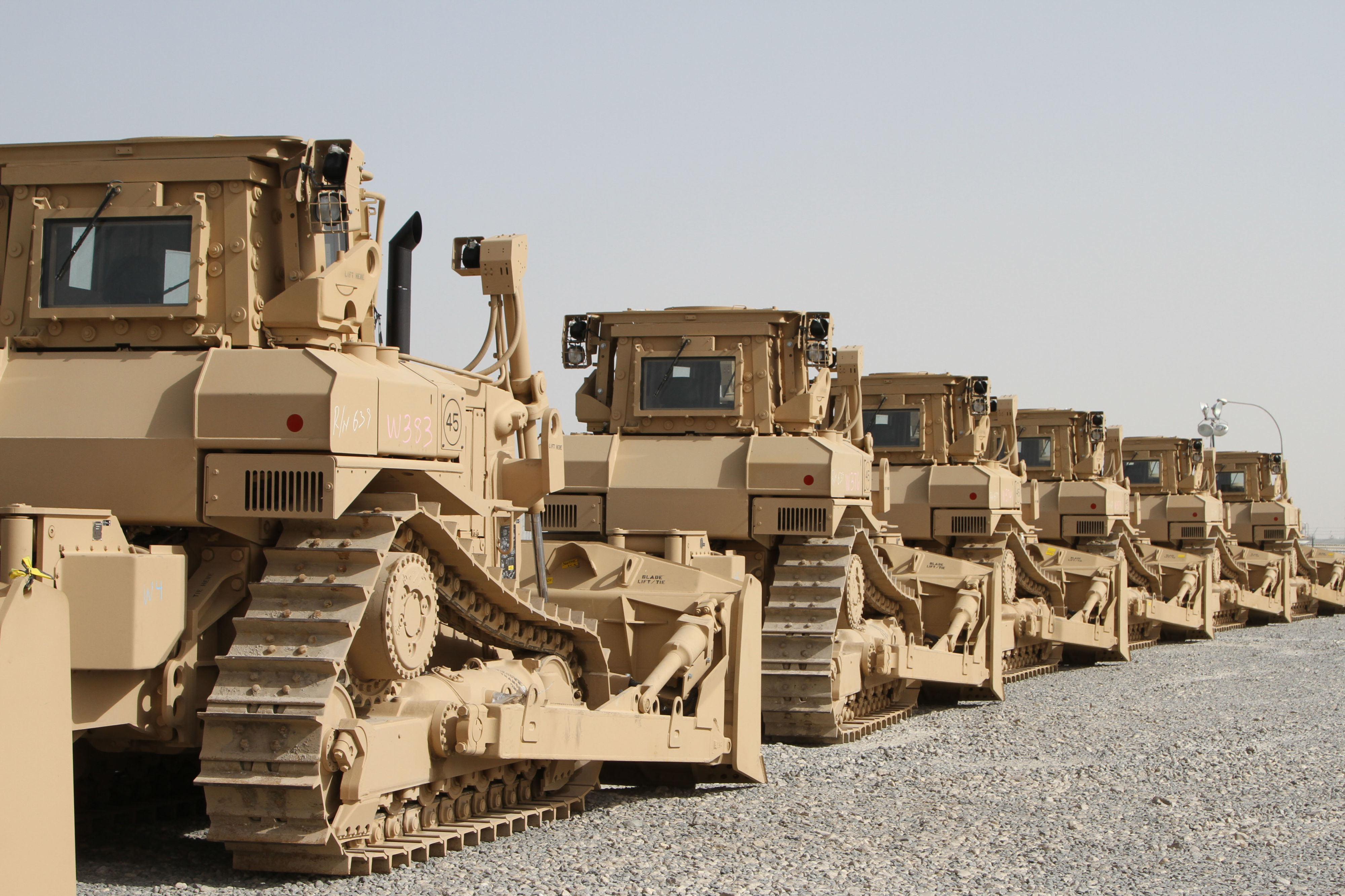 Military Dozer Armored Caterpillar D9 Dozer Assists With High Risk